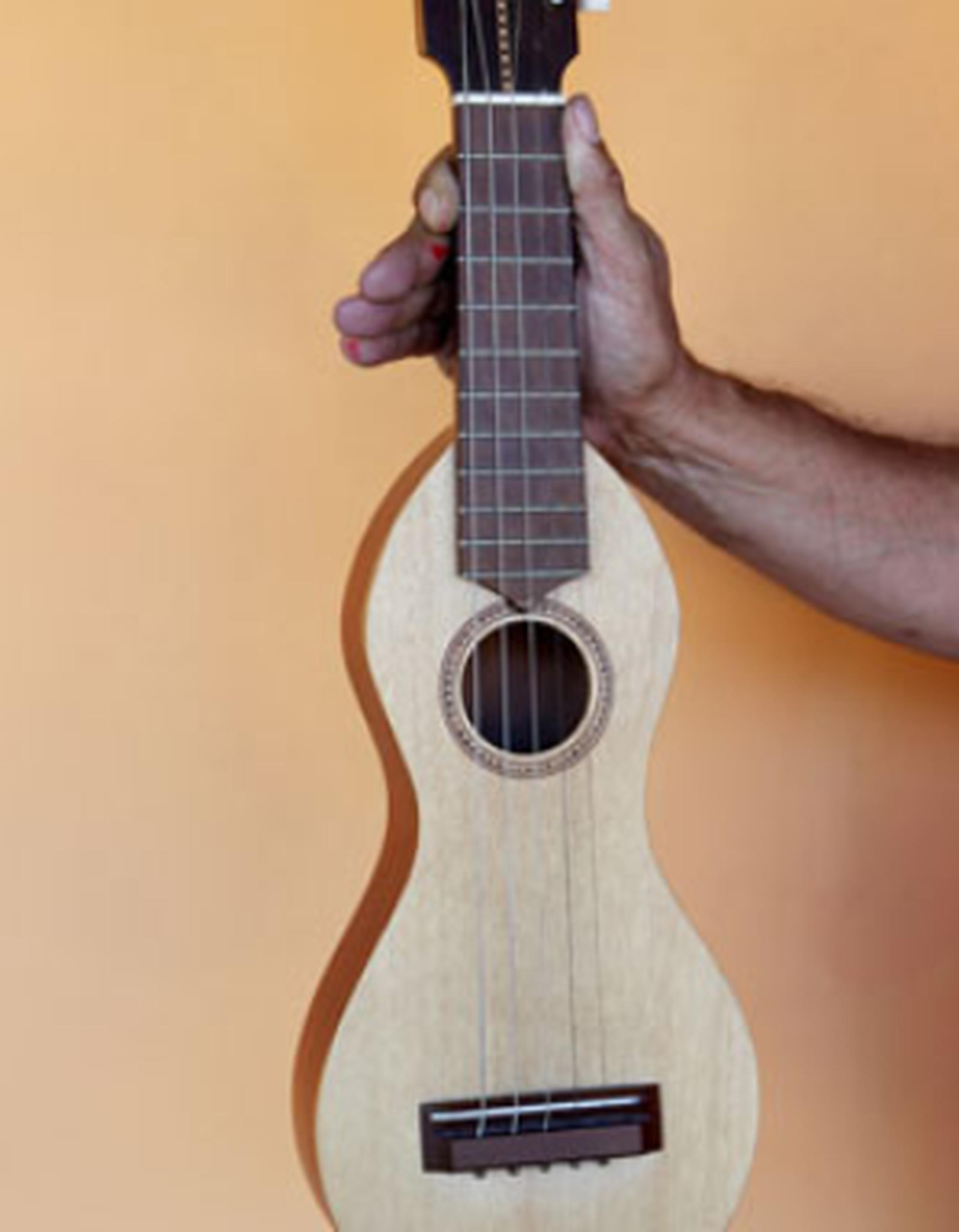 Puertorriqueños en Chicago rescatan y construyen instrumento nativo ...