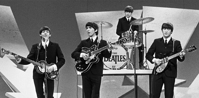 Los Beatles cumplen 50 años de su llegada a EE.UU. - Primera Hora